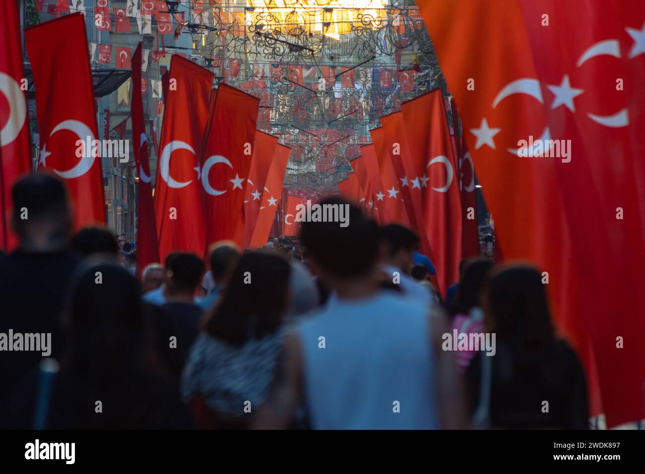 National holidays of Turkiye concept photo. Flags and Turkish people in ...