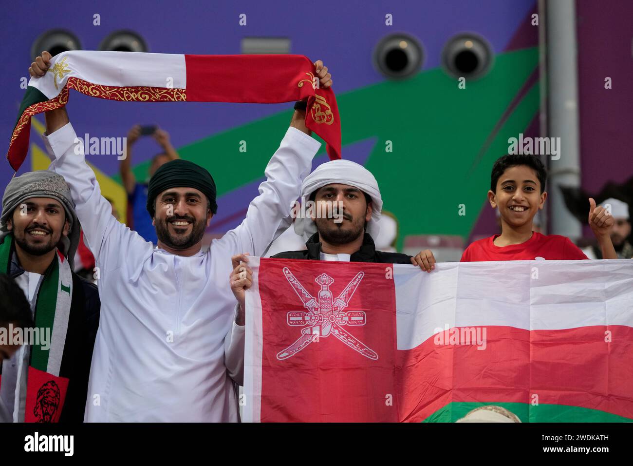 Oman supporters cheer for their team before the start of the Asian Cup ...