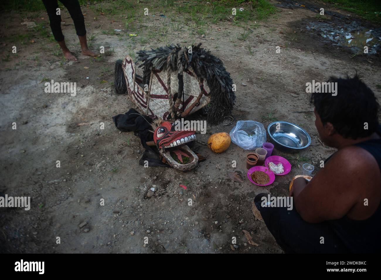Sprinkled with the aroma of incense, several Indigenous Javanese men ...