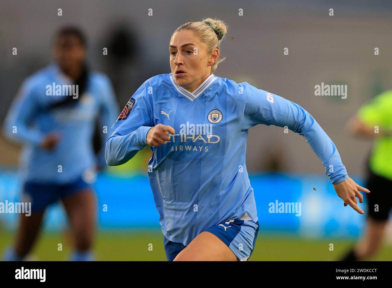 Laura Coombs of Manchester City runs with the ball during the The FA ...