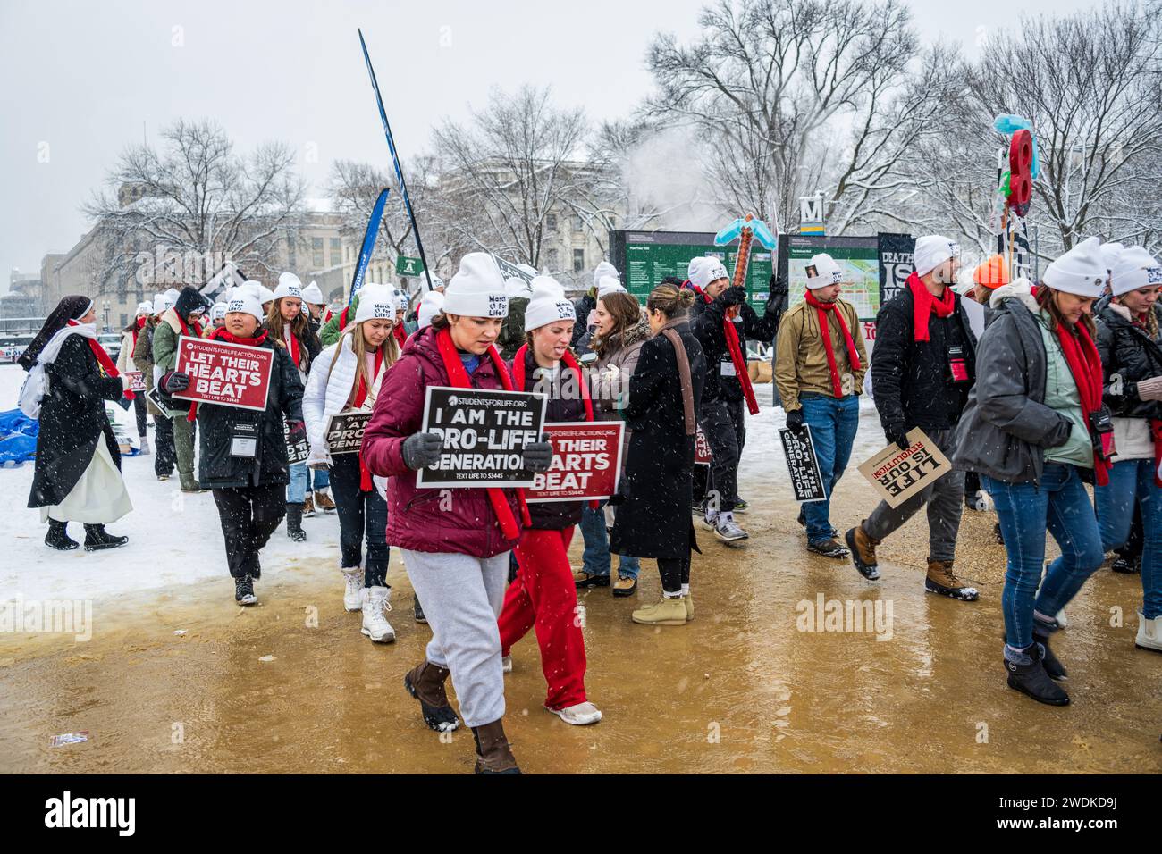 Washington, DC -- January 19, 2024. Marchers brave the snow for the ...