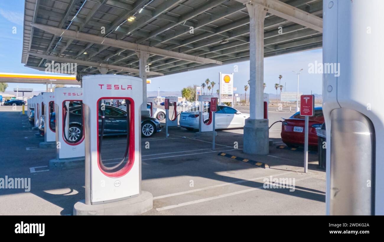 Daytime Tesla Charging, Supercharging Station Power-Up Stock Photo - Alamy