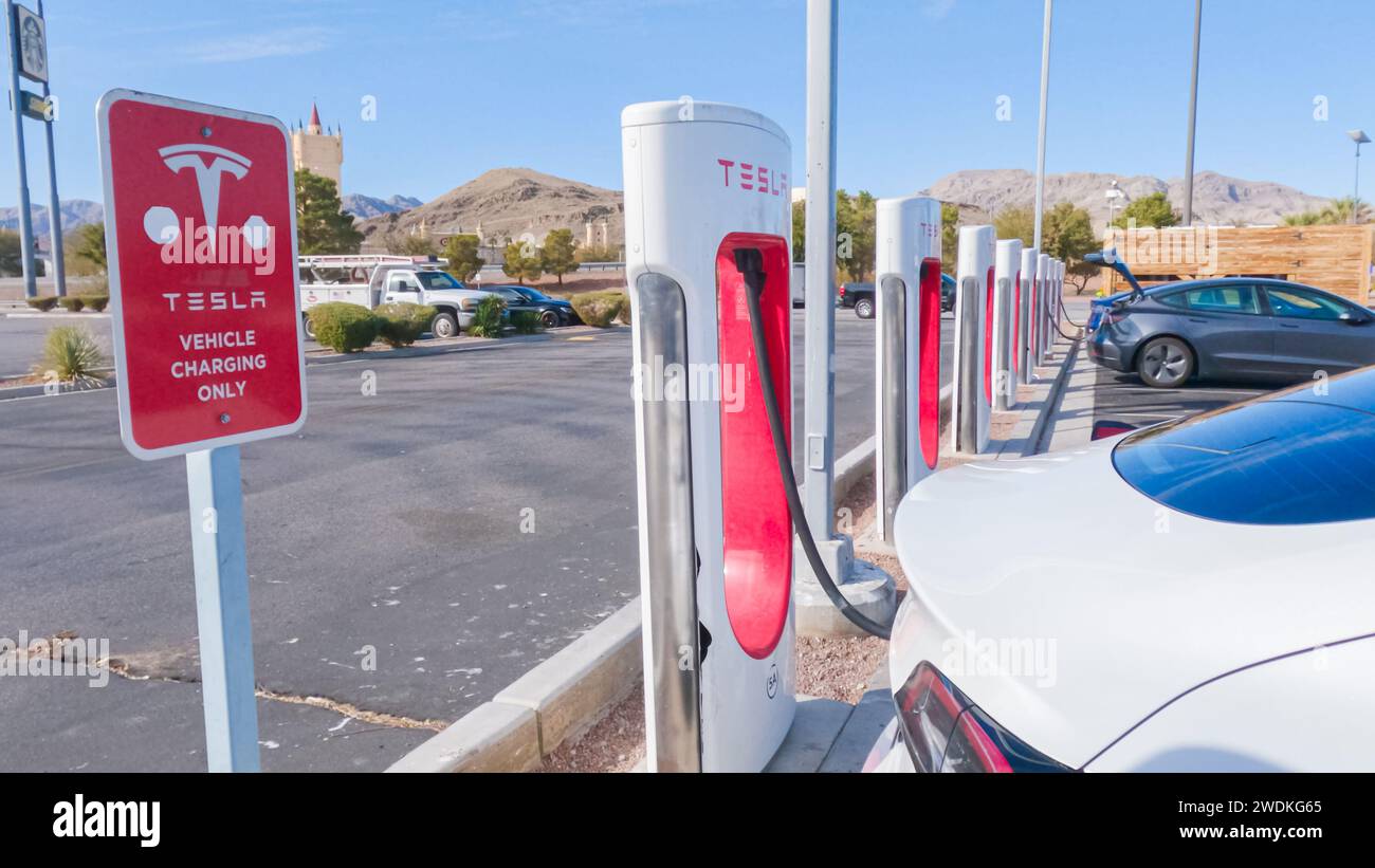 Daytime Tesla Charging: Supercharging Station Power-Up Stock Photo - Alamy