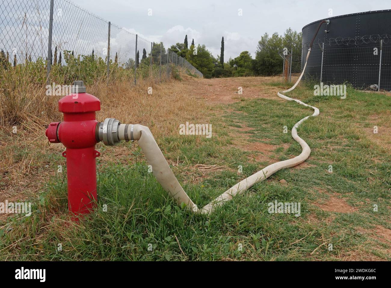 Fire hydrant with hose connected to water tank Stock Photo - Alamy Fire hydrant with hose connected to water tank Stock Photo - Alamy