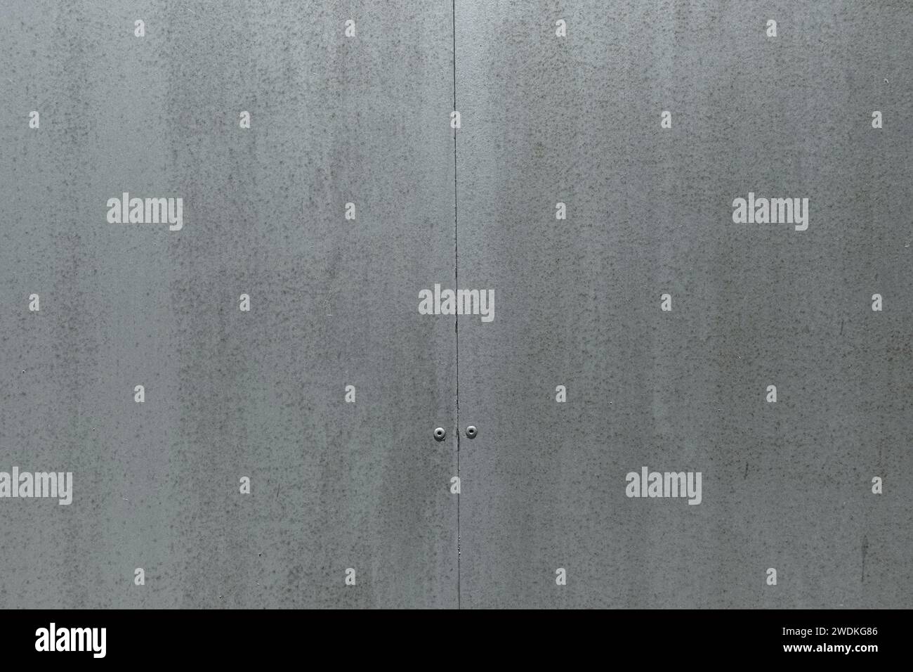 Weathered metal surface with rusty texture and bolts. Abstract ...