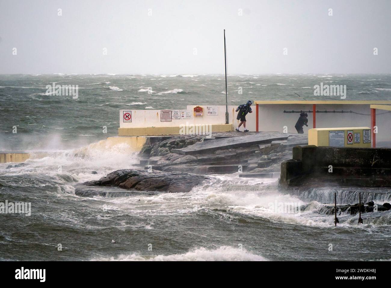 People taking photos of high waves at Salthill, Galway, during Storm ...