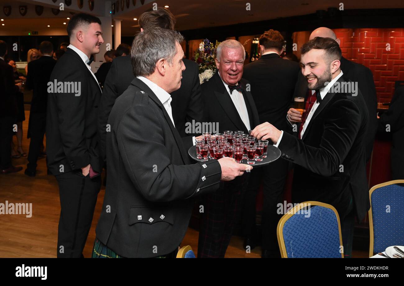 Nick Grecian CEO of London Scottish RFC offers a shot to the guests ...