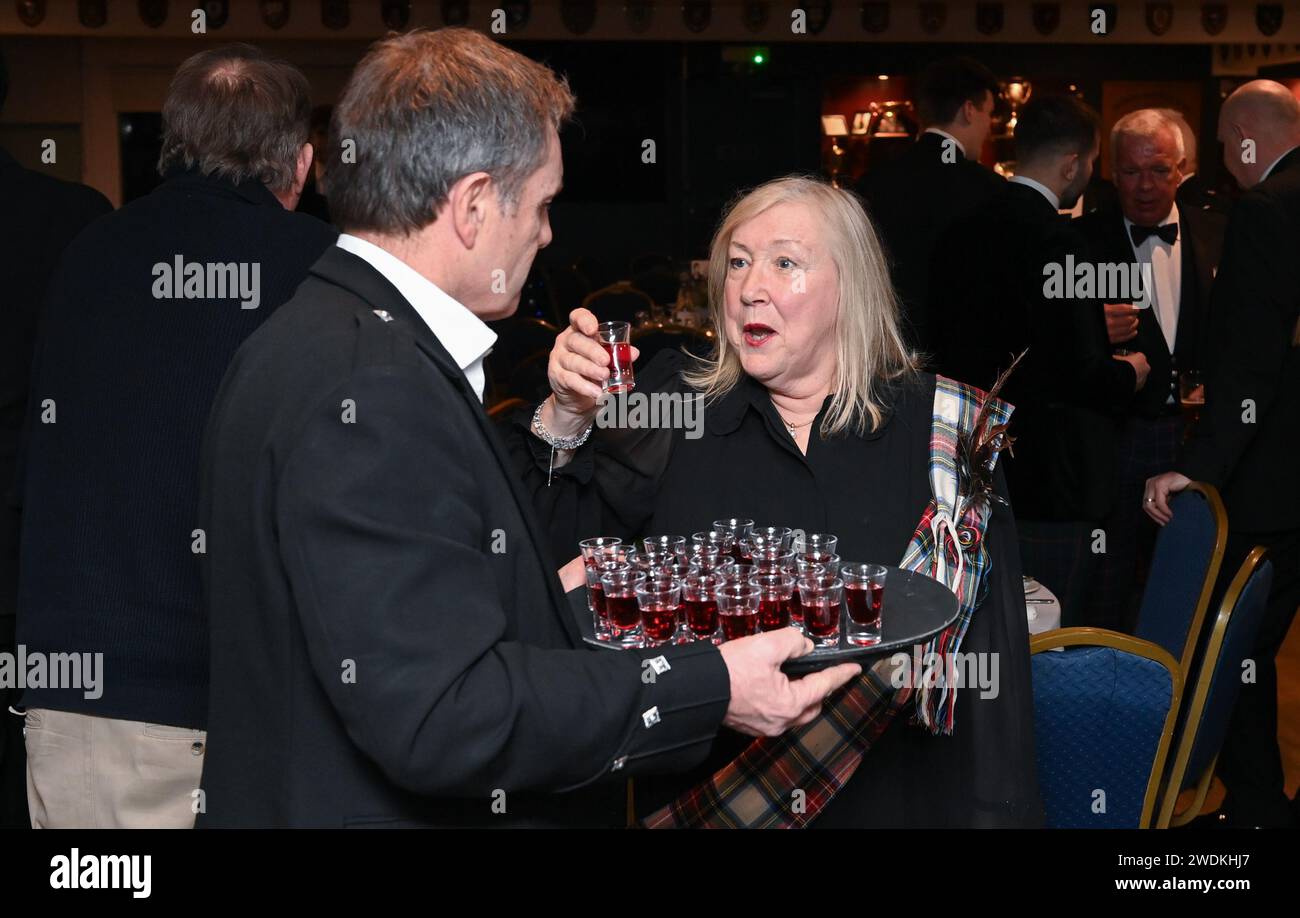 Nick Grecian CEO of London Scottish RFC offers a shot to the guests ...