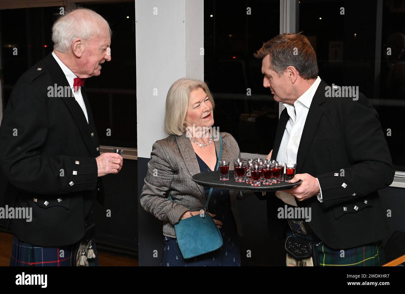Nick Grecian CEO of London Scottish RFC offers a shot to the guests ...