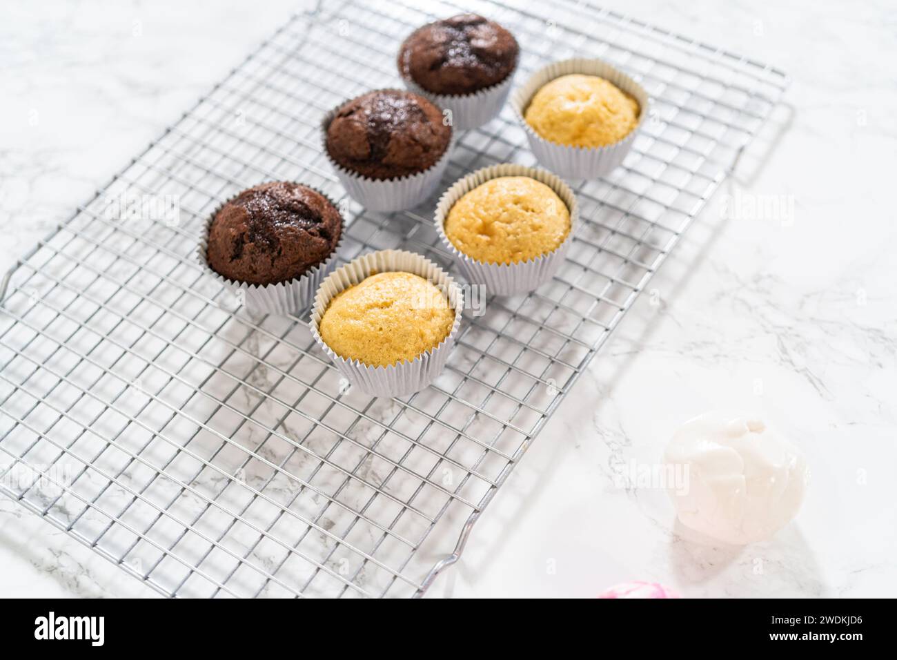 Creating Extravagant Cupcakes for Birthday Celebration Stock Photo - Alamy