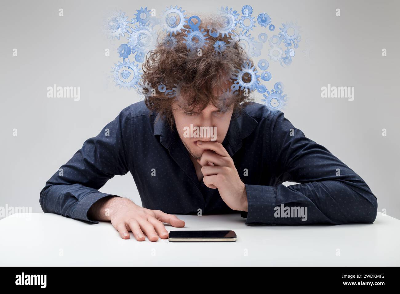 Pensive man contemplates phone, gears and virus symbols above hint at ...