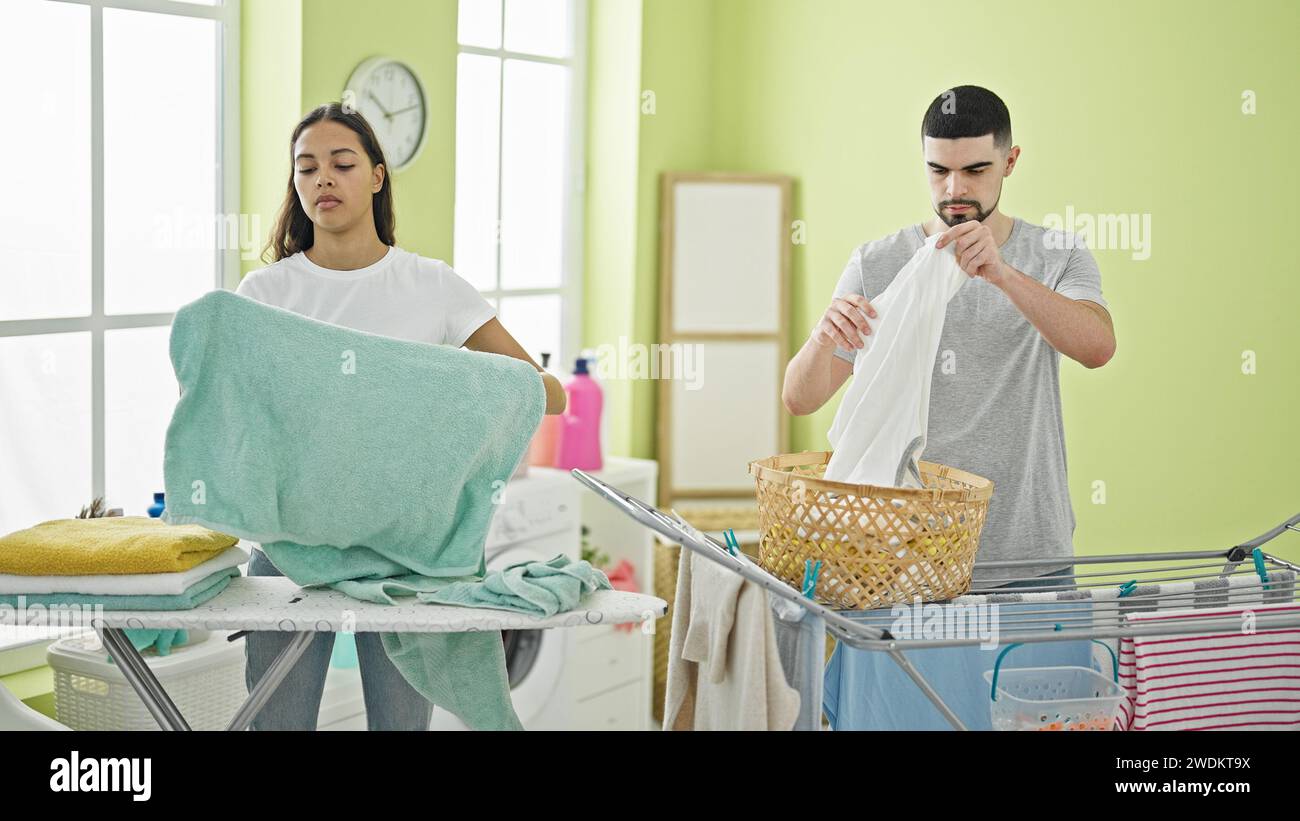Beautiful couple's love shines in laundry chores, sparking joy in the ...