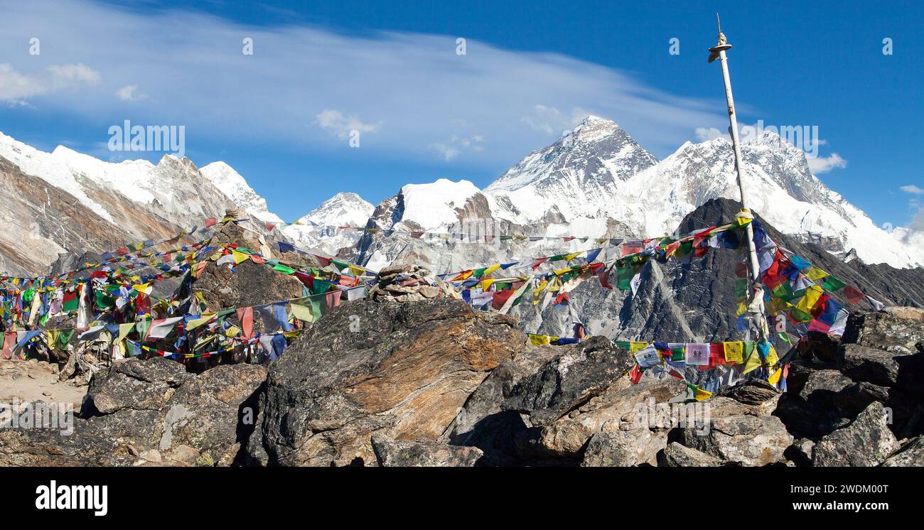 view of Mount Everest and Lhotse with buddhist prayer flags from Gokyo ...