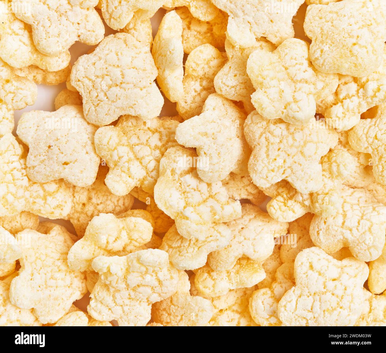 A close-up view of crispy rice cakes, emphasizing their texture and ...