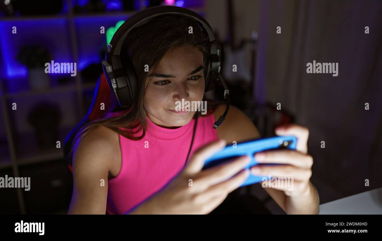 Confident young hispanic female gamer, a portrait of a beautiful ...