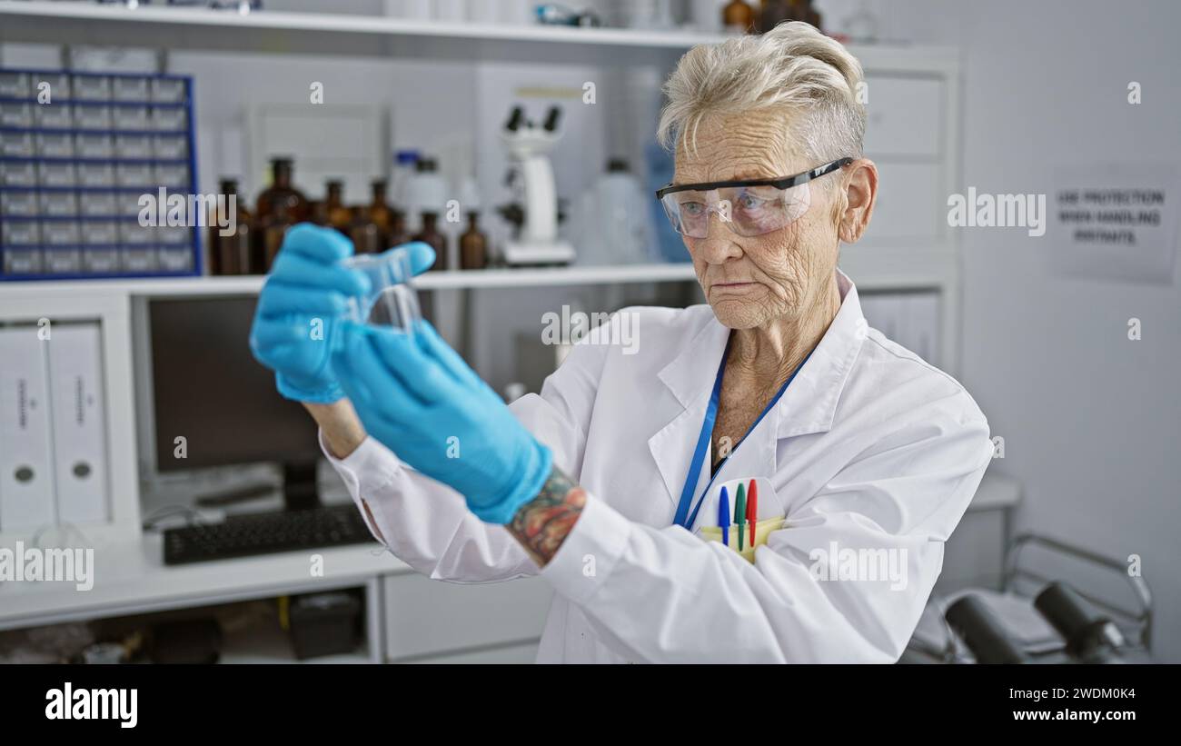 In the heart of science, a senior grey-haired woman scientist measuring ...