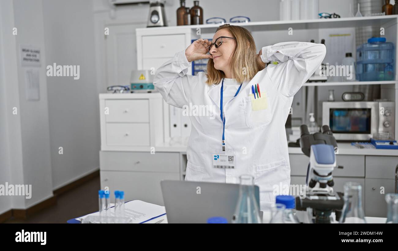Attractive blonde takes off glasses hi-res stock photography and images ...
