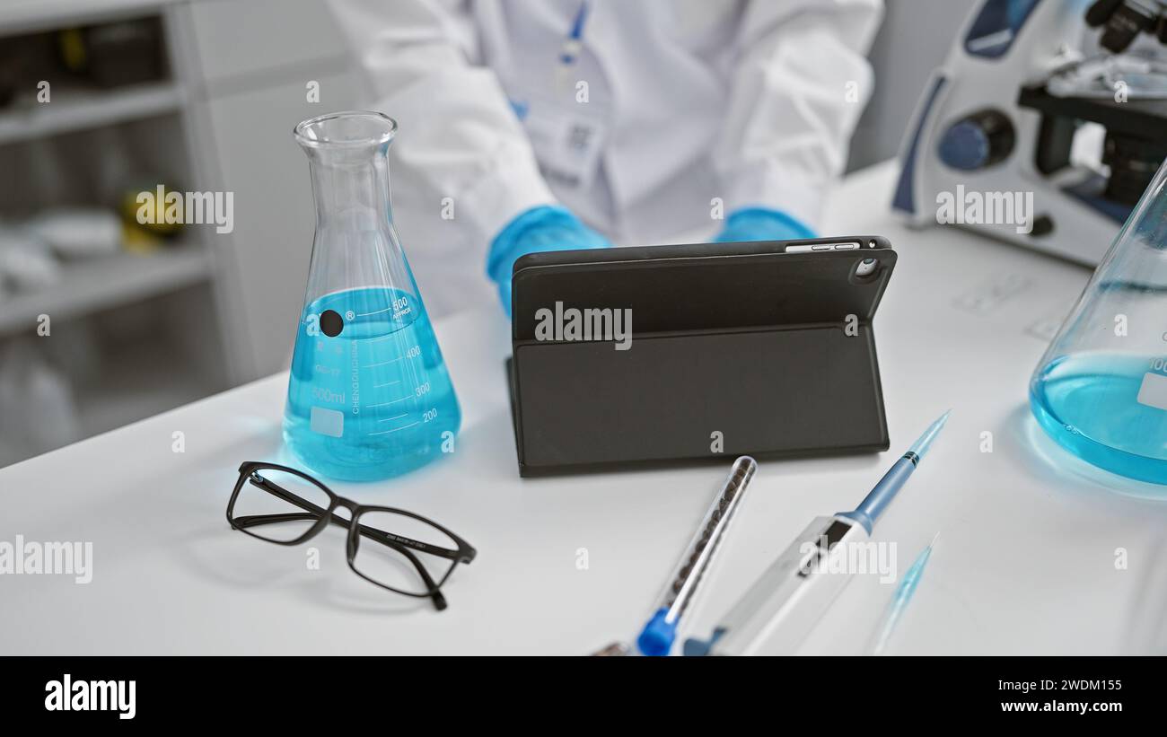 In the heart of science, hands of a dedicated, professional woman ...