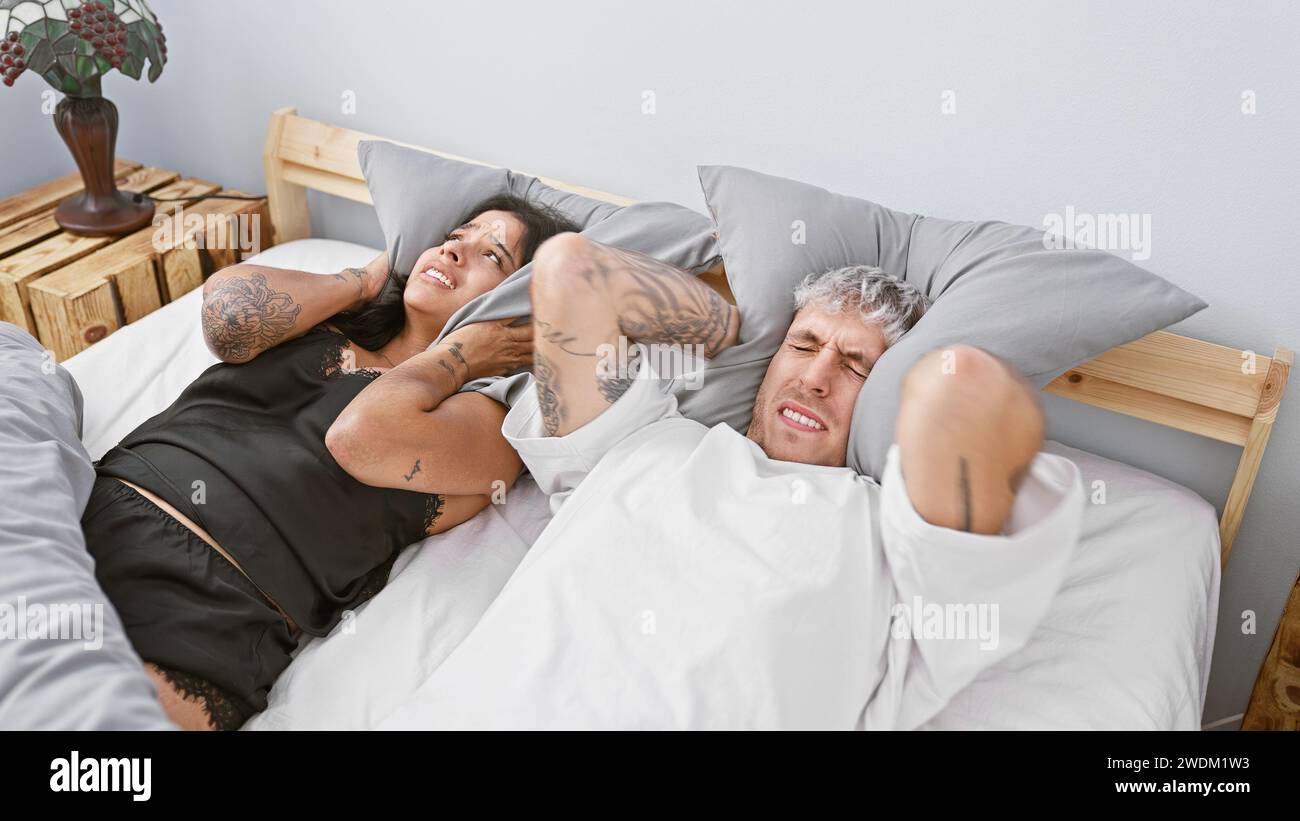 Couple and bed and awkward hi-res stock photography and images - Alamy