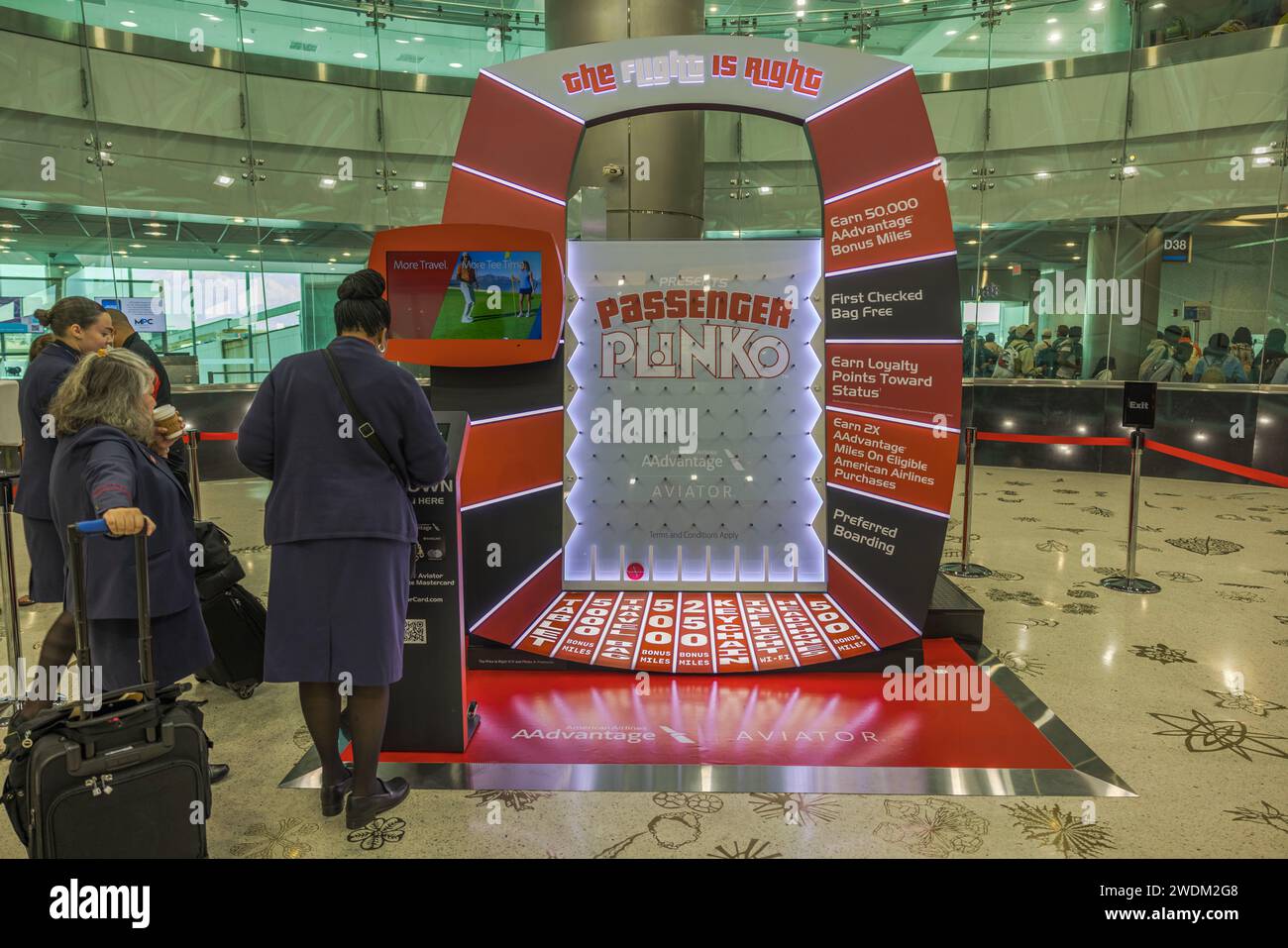 Queue forms at the Airport Lottery Stand, where passengers eagerly vie ...