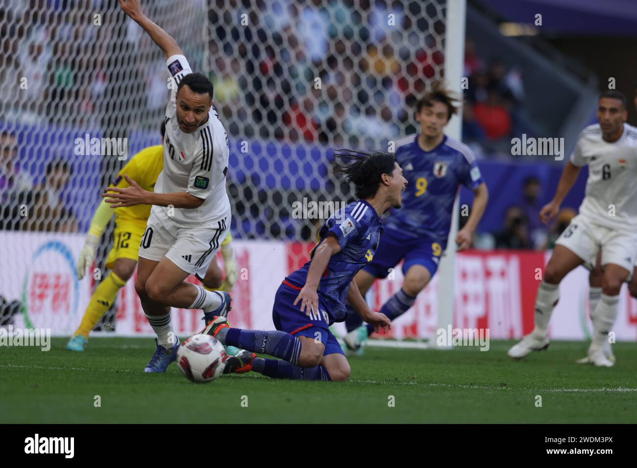 Qatar, Al Rayyan 19 January 2024 - Takumi Minamino of Japan and Osama ...