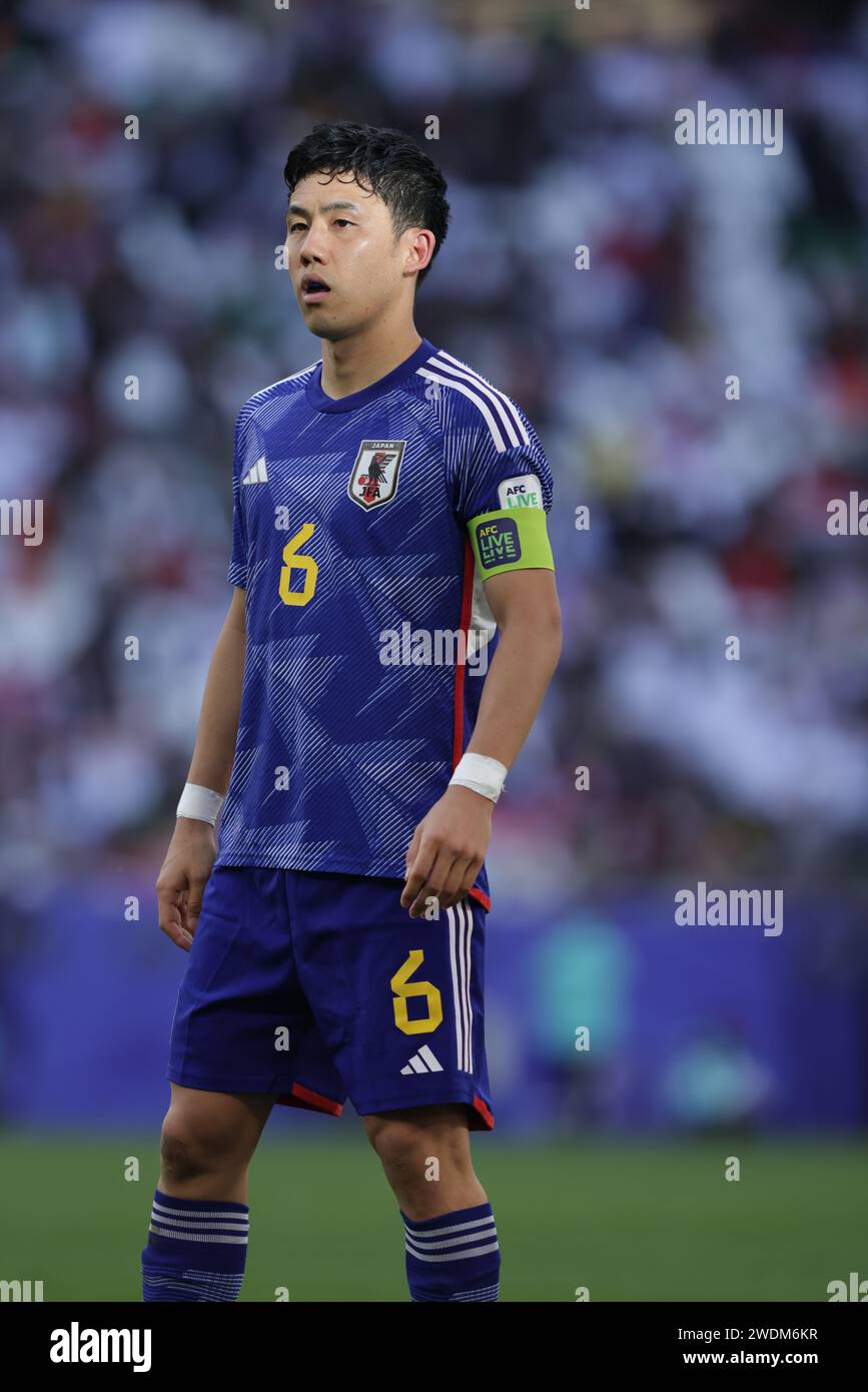 Qatar, Al Rayyan 19 January 2024 - Wataru Endo of Japan with captain ...
