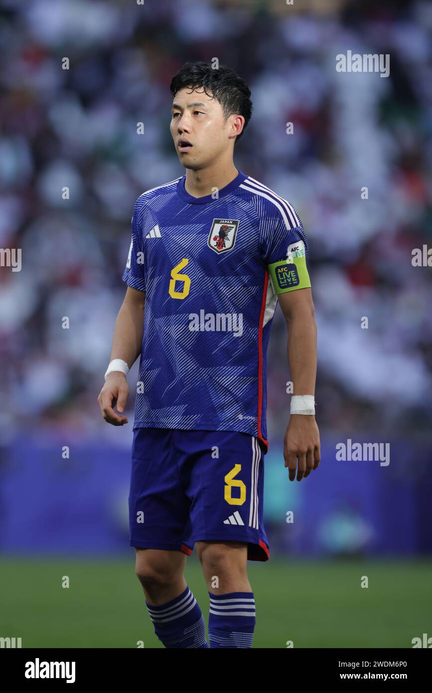 Qatar, Al Rayyan 19 January 2024 - Wataru Endo of Japan with captain ...