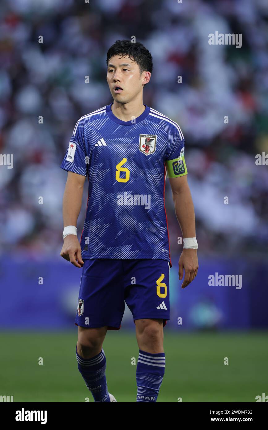 Qatar, Al Rayyan 19 January 2024 - Wataru Endo of Japan with captain ...