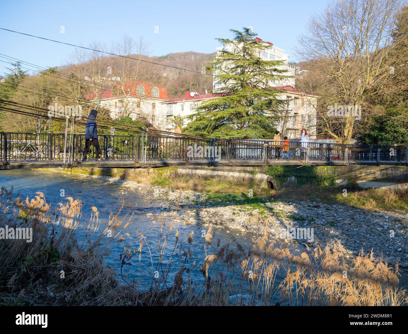 Sochi, Russia - February 11, 2023: Pedestrian bridge across the Khosta ...