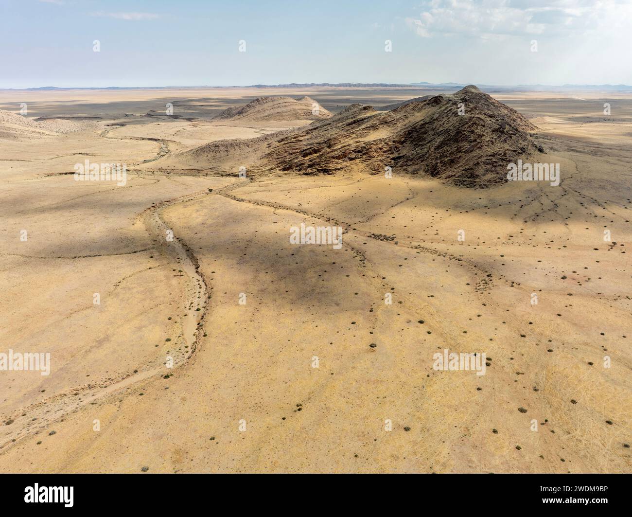 Aerial view of a desert landscape viewed by drone from the C14 Road to ...
