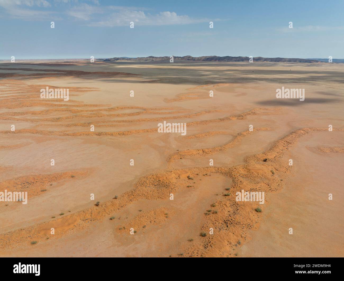 Aerial view of a desert landscape viewed by drone from the C14 Road to ...