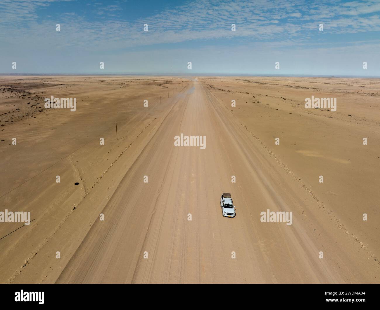 Aerial view of a Four-wheels Drive on C35 desert track around the ...
