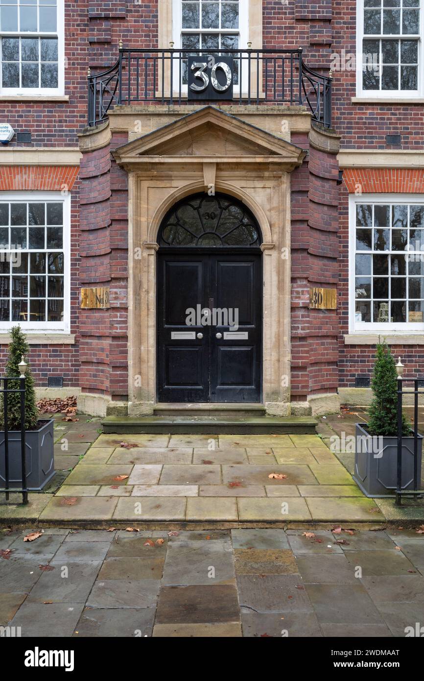 Large black wooden panel door Stock Photo - Alamy