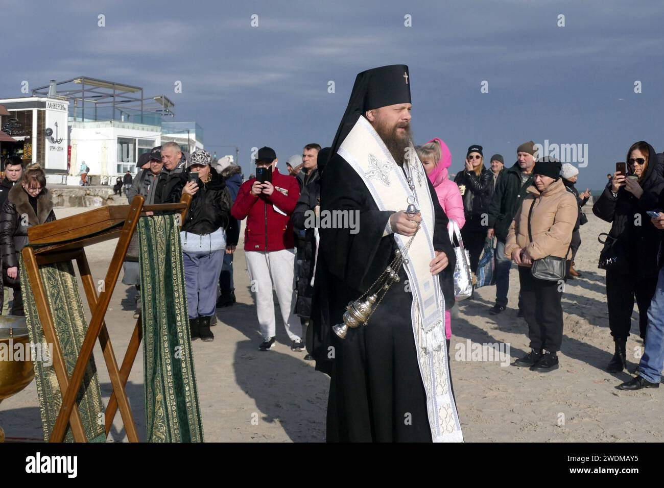 Non Exclusive: ODESA, UKRAINE - JANUARY 19, 2024 - A priest swings a ...