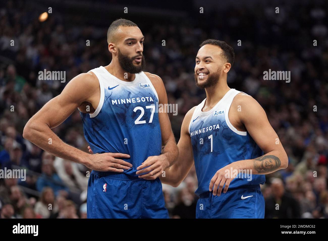 Minnesota Timberwolves center Rudy Gobert (27) and forward Kyle Anderson (1) stand together ...