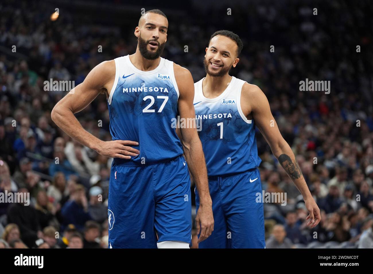 Minnesota Timberwolves center Rudy Gobert (27) and forward Kyle Anderson (1) stand together ...