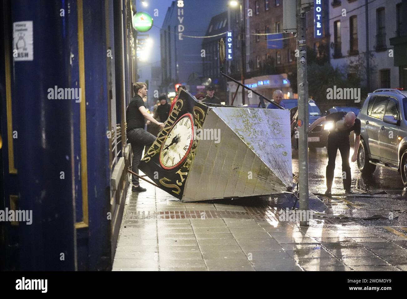 A clock tower falls to the ground in Eyre Square, Galway, during Storm ...