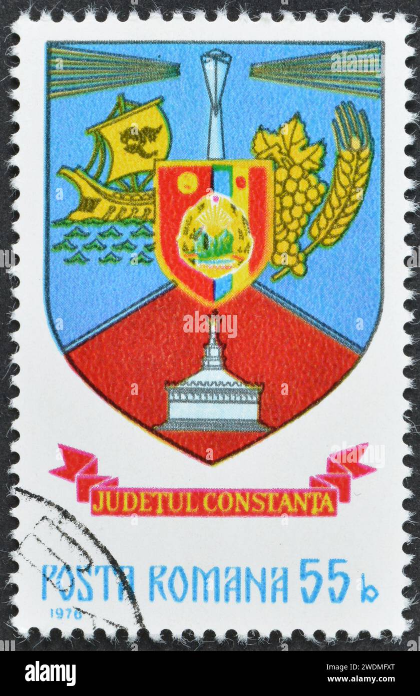 Cancelled postage stamp printed by Romania, that shows Coat of arms of ...