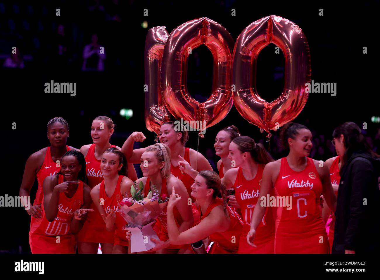 England players celebrate with Helen Housby to mark her 100th cap after ...