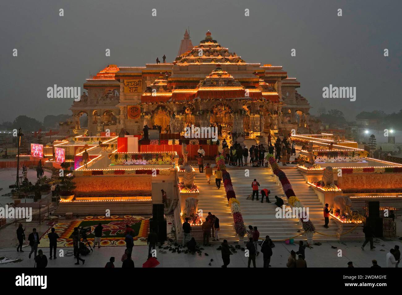 Workers decorate a temple dedicated to Hindu deity Lord Ram with ...