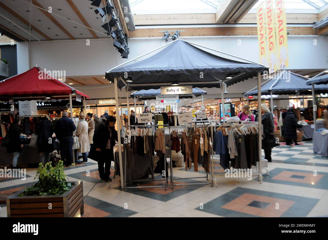 Copenhagen, Denmark /21 January 2024/.consumers loooks at discoints ale ...