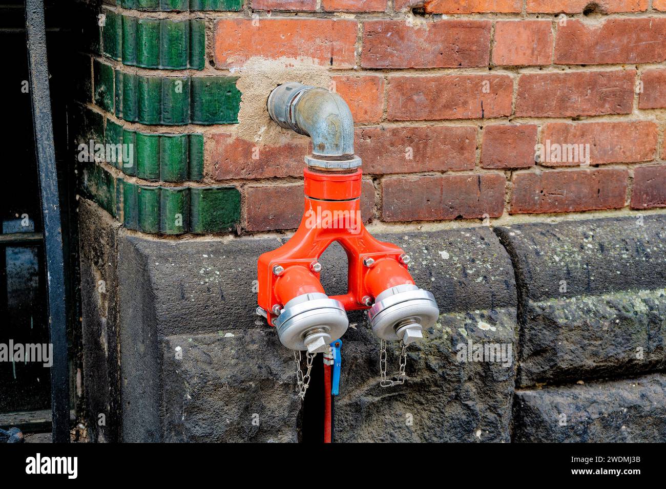 Fire hydrant with hose connection for the fire brigade on a building ...