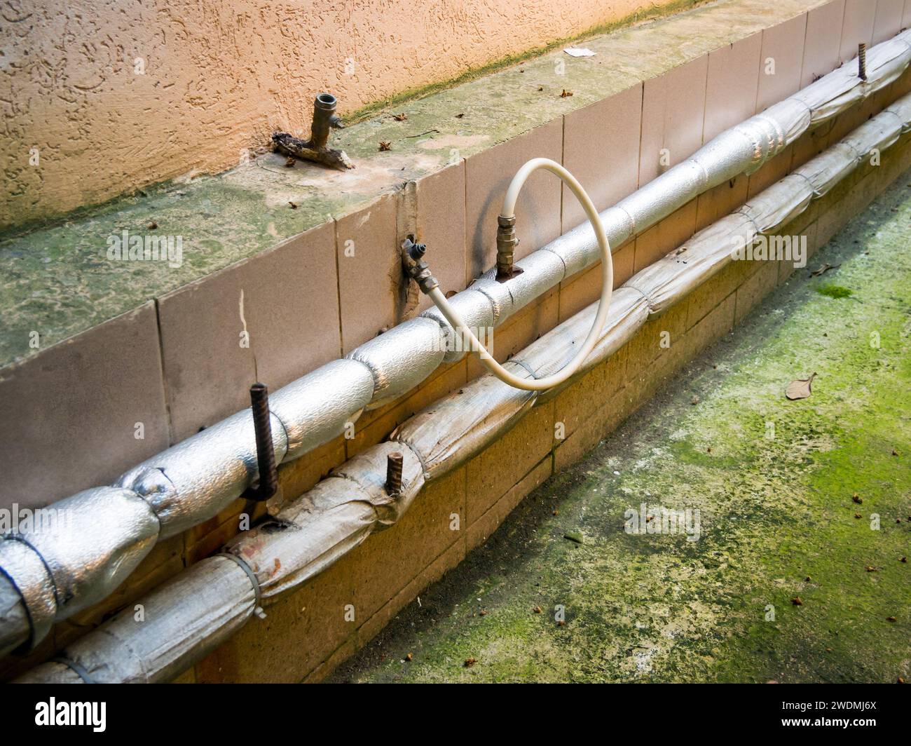 The heating main is mounted outside the building Stock Photo - Alamy