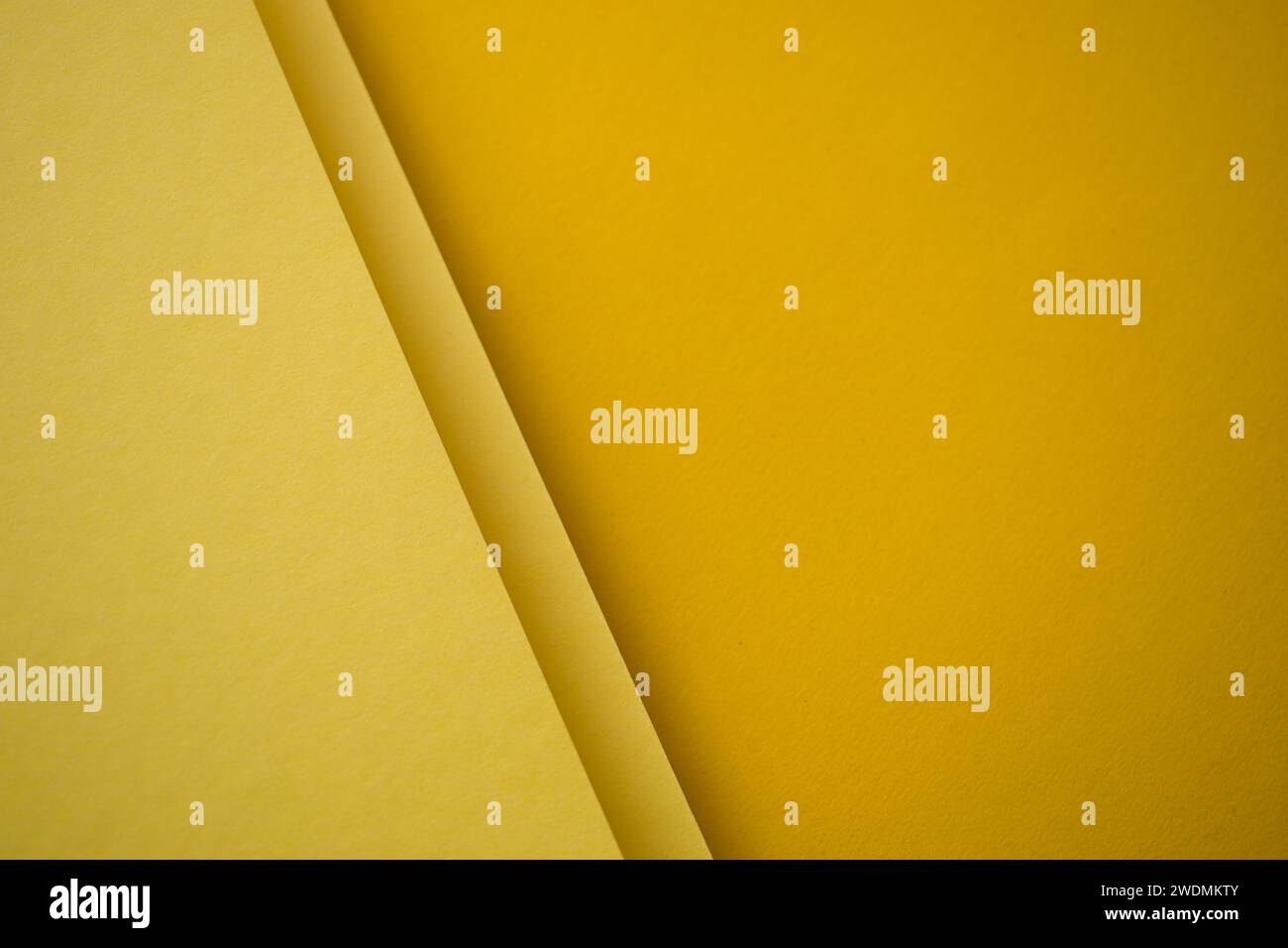 Abstract yellow 3d divided diagonally background Stock Photo - Alamy