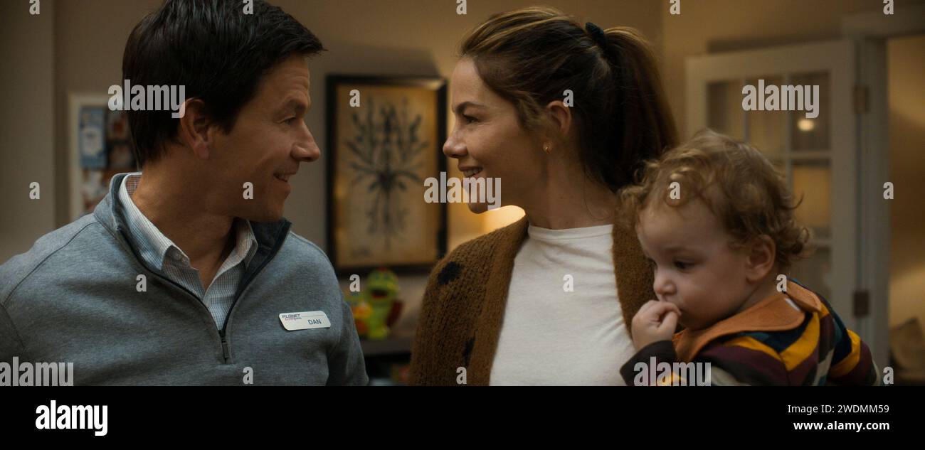 MARK WAHLBERG and MICHELLE MONAGHAN in THE FAMILY PLAN (2023), directed by SIMON CELLAN JONES ...