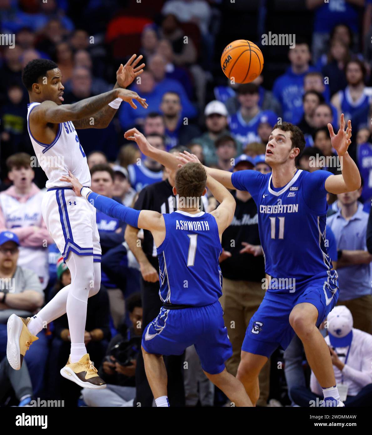 Seton Hall guard Al-Amir Dawes (2) passes the ball over the heads of ...