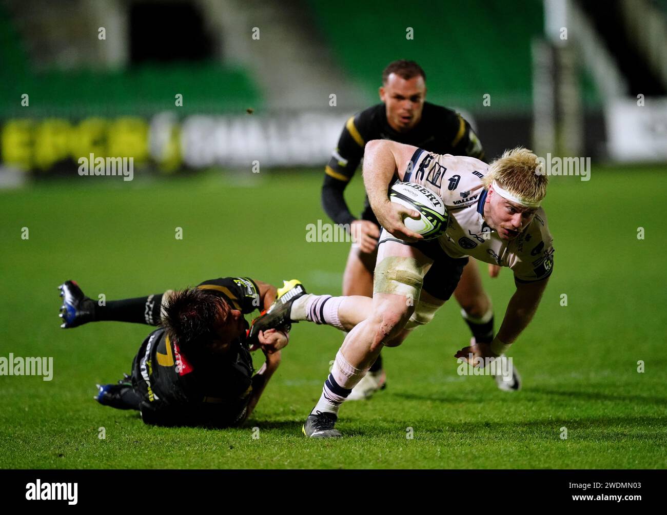 Dragons RFC's Aaron Wainwright is tackled by Hollywoodbets Sharks ...