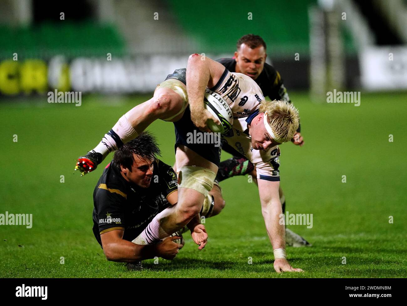 Dragons RFC's Aaron Wainwright is tackled by Hollywoodbets Sharks ...