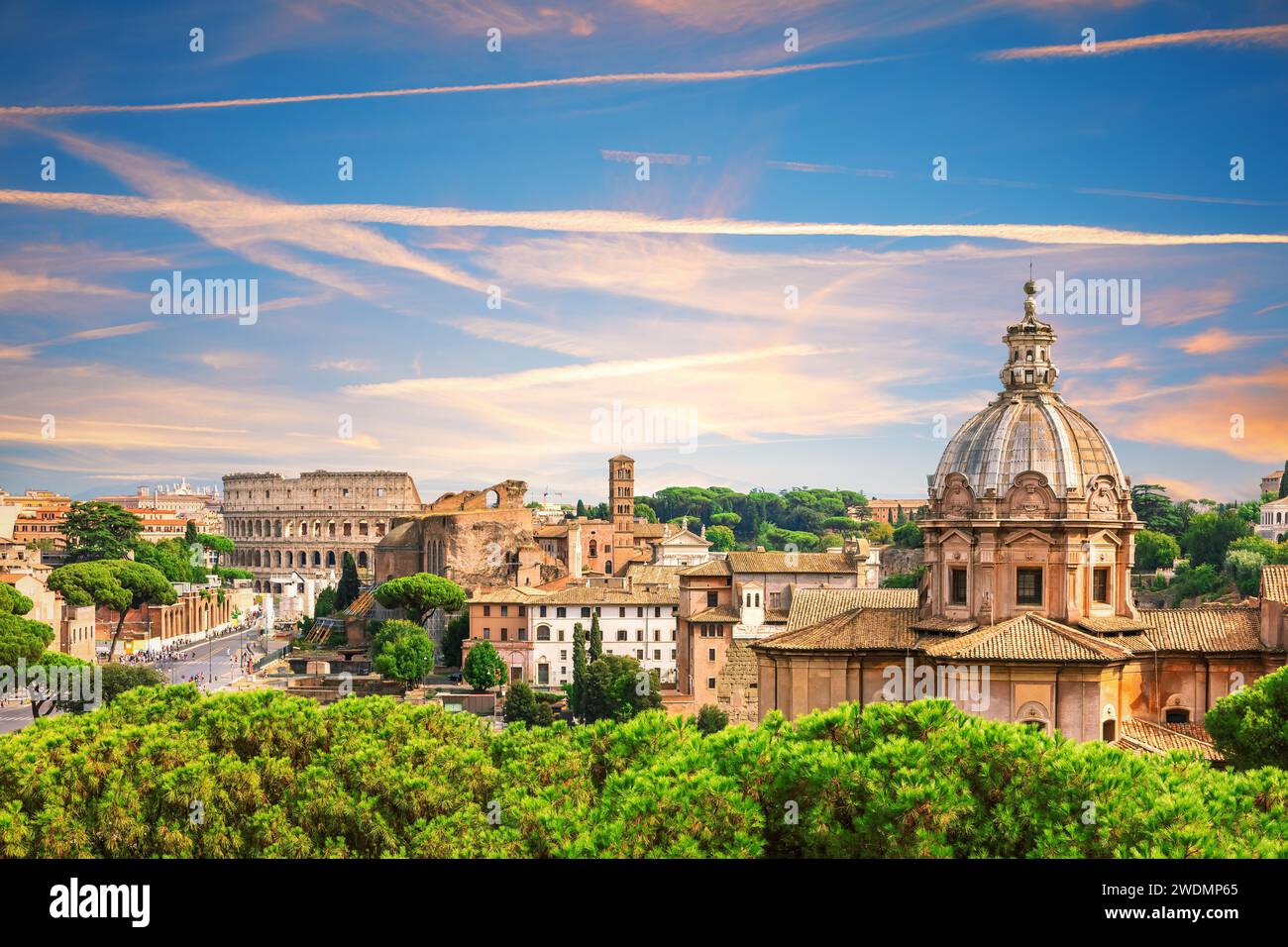 Aerial view of Rome, the dome and the Coliseum in the backyard, Italy ...