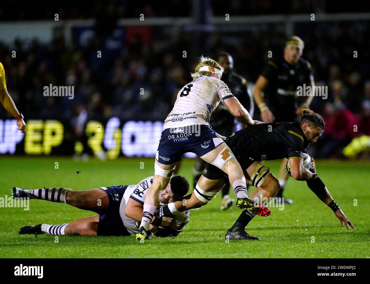 Hollywoodbets Sharks' Gerbrandt Grobler is tackled by Dragons RFC's ...